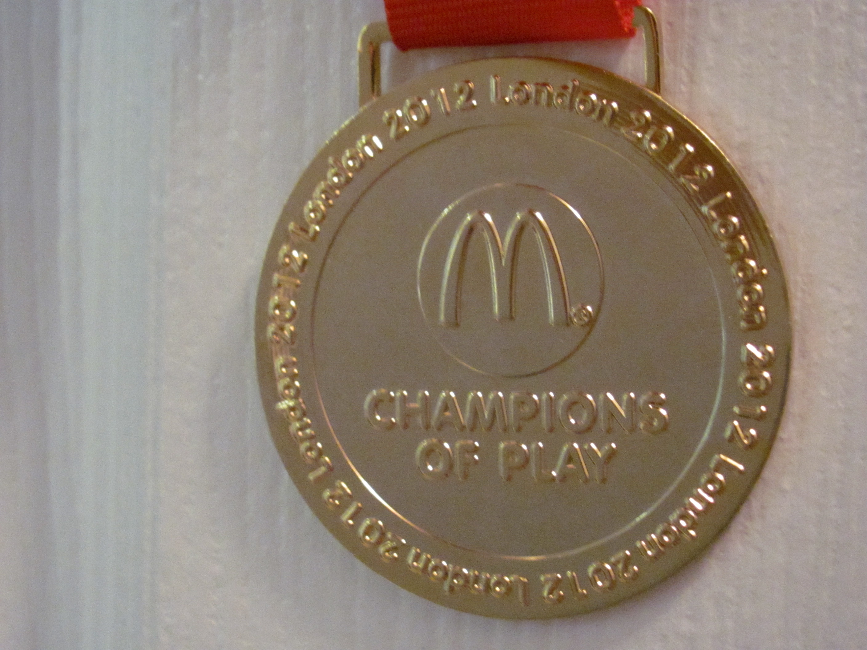 My medal and certificate presented by Dara Torres and McDonald’s ...